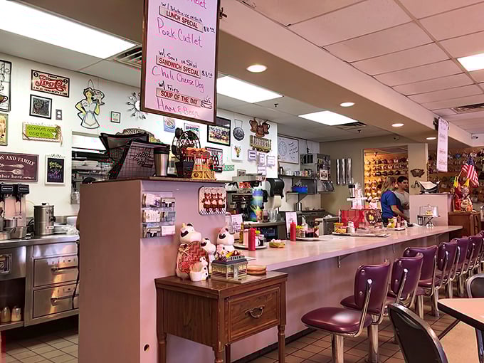 That classic diner counter where the best conversations happen over coffee and the daily special, no reservations required.