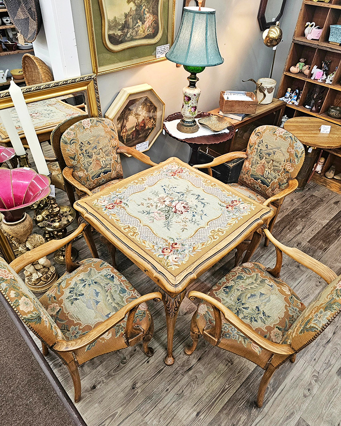 This elegant needlepoint dining set isn't just furniture—it's a portal to fancy dinner parties of the past. Tea, anyone?