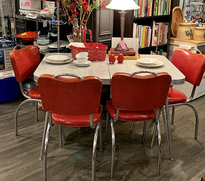 Those cherry-red vintage diner chairs aren't just seating—they're time machines to when breakfast meant conversation, not scrolling through phones.