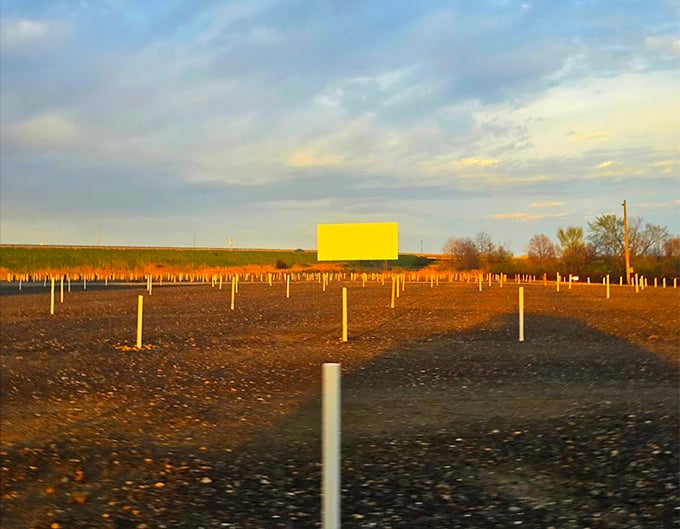 Empty now, but soon to be filled with excitement—the drive-in at golden hour. Like a theater before the audience arrives, full of possibility.