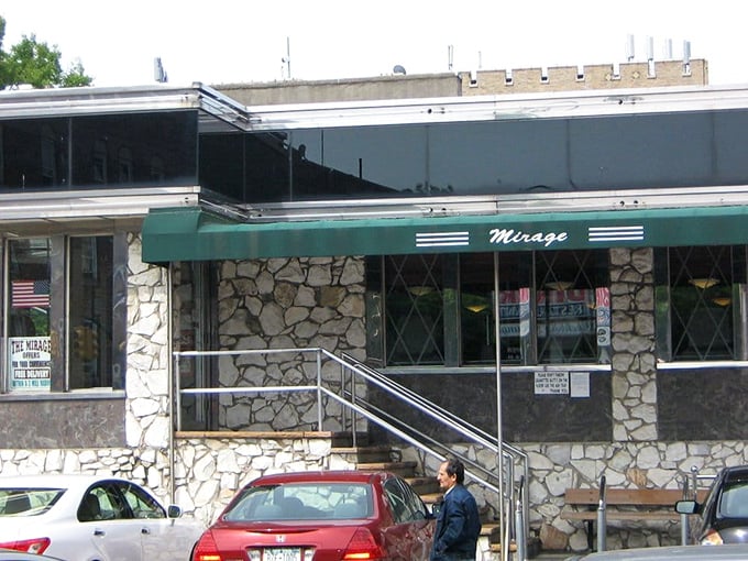 Another view of the stone exterior and green awning—architectural features that whisper "come in, the meatloaf is waiting." Timeless design for timeless food.