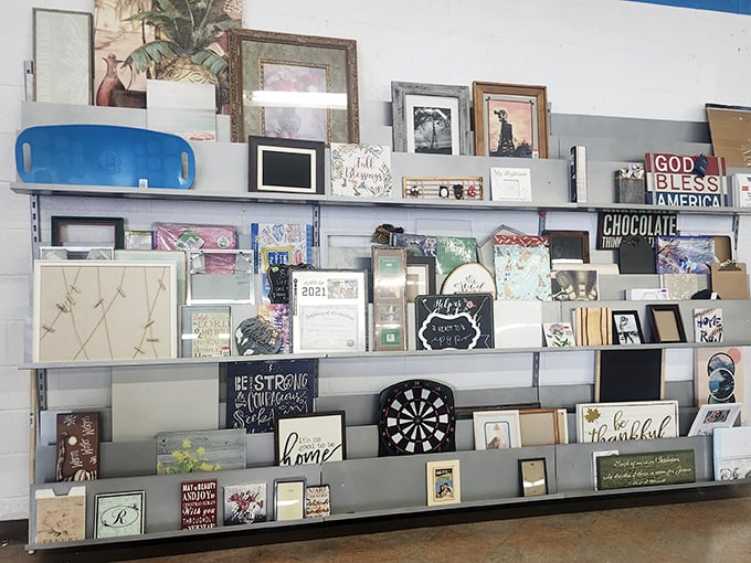 The wall of inspirational art – where "Live, Laugh, Love" meets "God Bless America" meets "CHOCOLATE" in perfect decorative harmony.
