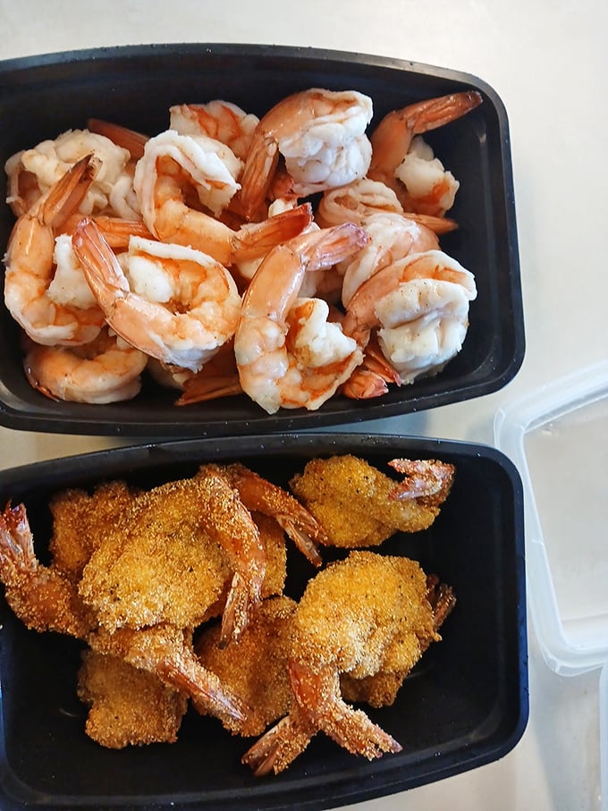 Boiled shrimp up top, fried shrimp below – it's like getting the best of both oceanic worlds in one glorious container.