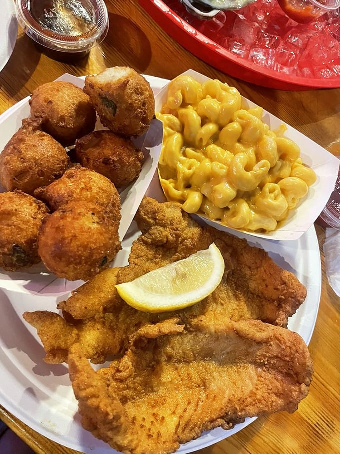 A Florida feast that would make Neptune jealous—golden fried fish, hushpuppies, and mac and cheese that tastes like someone's grandma made it.
