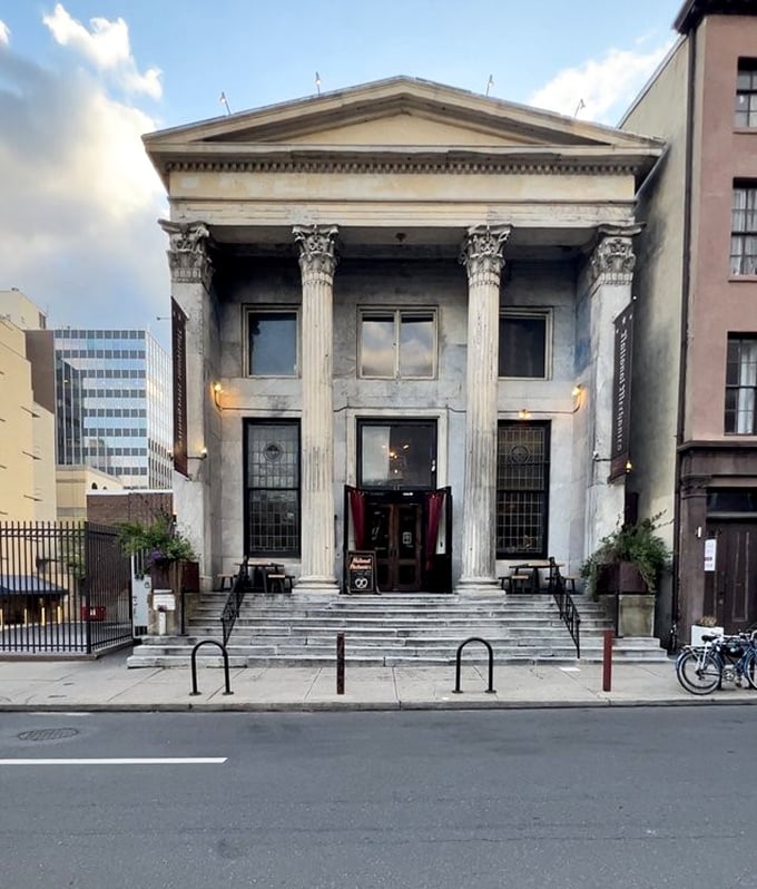 Columns that would make ancient Greeks proud. This isn't just a restaurant entrance – it's a portal to a deliciously different dining dimension.