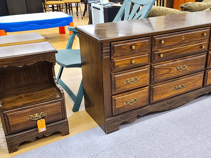 Solid wood furniture with stories to tell, waiting for its next chapter. That dresser has probably seen more bedroom drama than a soap opera.