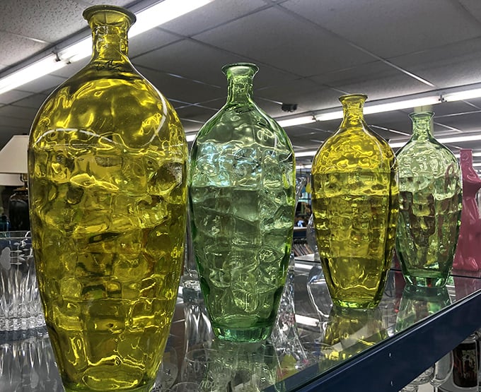 These glass vessels aren't just vases—they're liquid sunshine and seafoam captured in sculptural form, waiting for their next windowsill. 