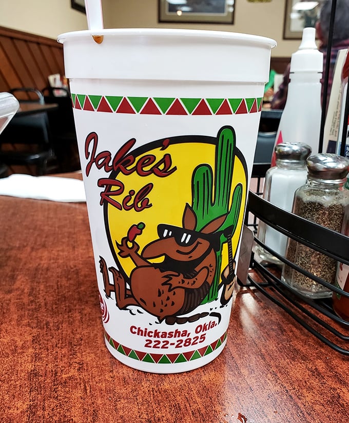 Their signature cup featuring a sassy armadillo mascot—because great barbecue deserves memorable branding and ice-cold drinks.