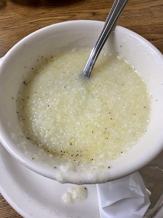 Grits so creamy and comforting they could end family feuds. The South's breakfast treasure finds a worthy home in this Cleveland institution.