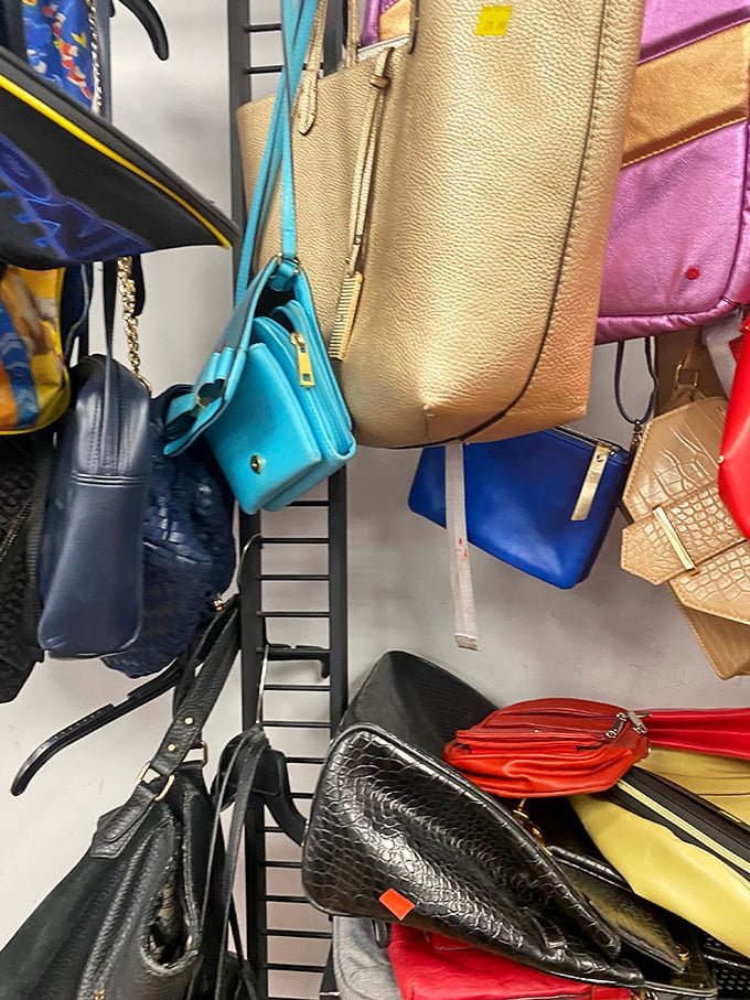 Handbag heaven! Designer dreams at earthly prices – each one previously carried through Manhattan's concrete canyons, now awaiting new adventures.