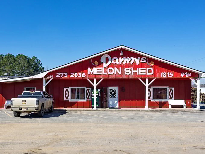 Danny's Melon Shed isn't trying to be Instagram-worthy—it's authentically utilitarian, a temple of watermelon worship painted the color of summer.