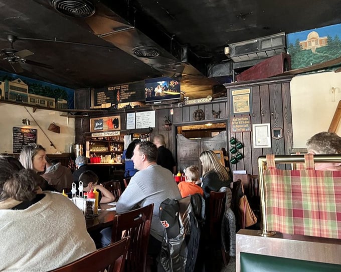 Families gather in the warm wooden interior, proving that Zip's isn't just about great burgers – it's about creating memories around a table.