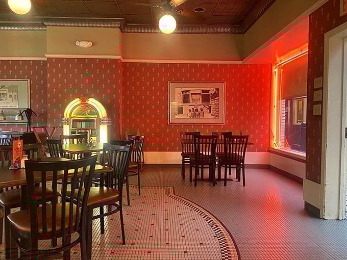 Red walls and vintage charm create the perfect backdrop for serious meat consumption—this isn't just a meal, it's a barbecue time capsule.