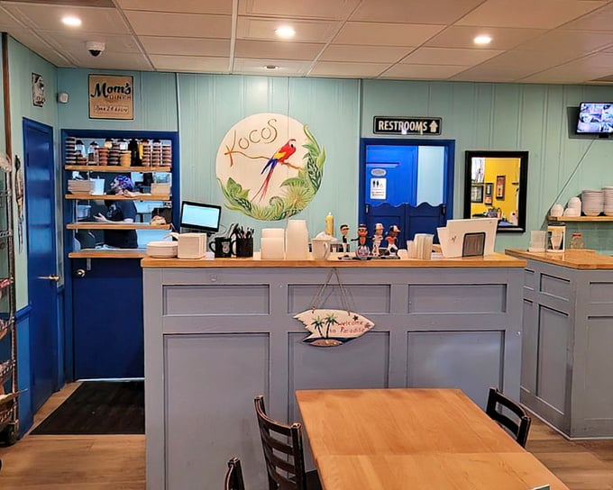 The blue and yellow interior feels nautical without trying too hard—like the dining room of a favorite aunt who moved to the shore and never looked back.
