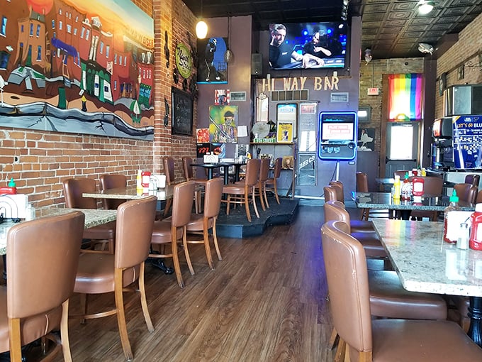 Where music meets mealtime—this dining area's colorful murals and warm lighting create the perfect stage for the real stars: the sandwiches.