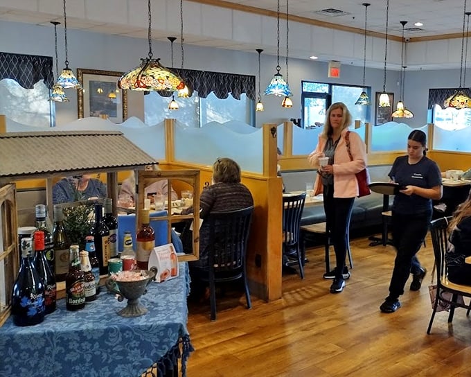 The dining room at Carol's feels like Minnesota's living room—warm wood tones, Tiffany lamps, and the promise of turkey dinner just steps away.