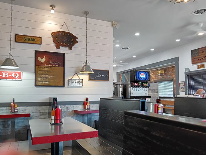 Modern touches meet classic barbecue aesthetics – white shiplap walls adorned with pig-themed décor, because they know exactly what they're about.