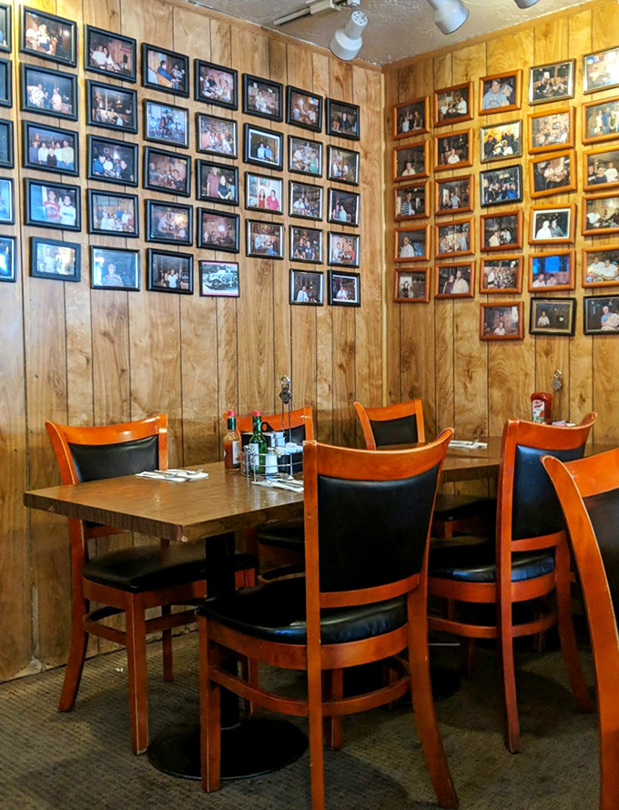 The wall of photos tells you everything: this isn't just a restaurant, it's a community living room with better food.