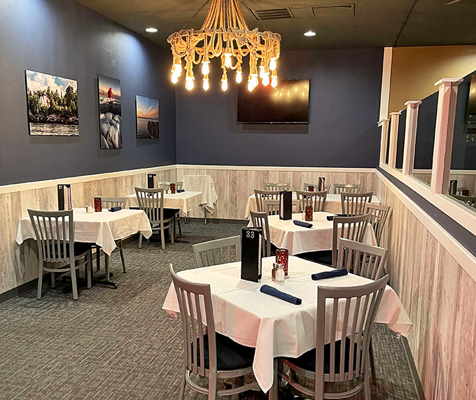 Blue walls and distinctive lighting create dining rooms with character—the stage is set for memorable meals.