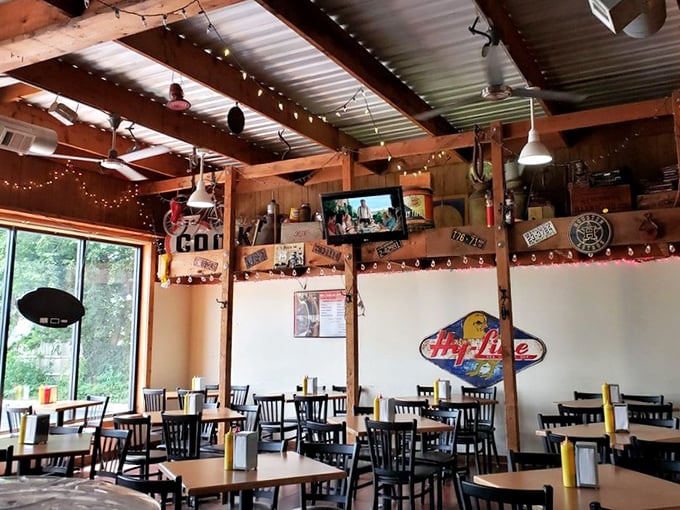 The dining room's exposed beams and string lights create that "we're all friends here" vibe that makes food taste even better.