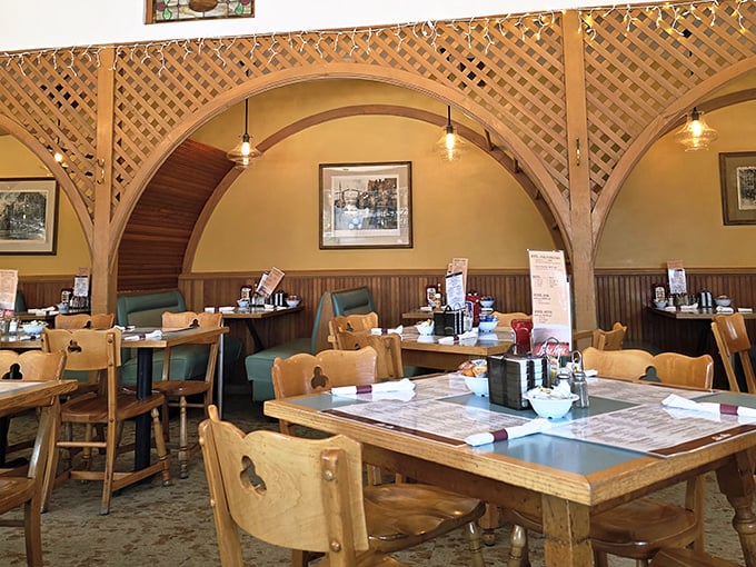 Those wooden lattice arches aren't just architectural details—they're dividers between worlds, separating your breakfast sanctuary from everyday concerns.