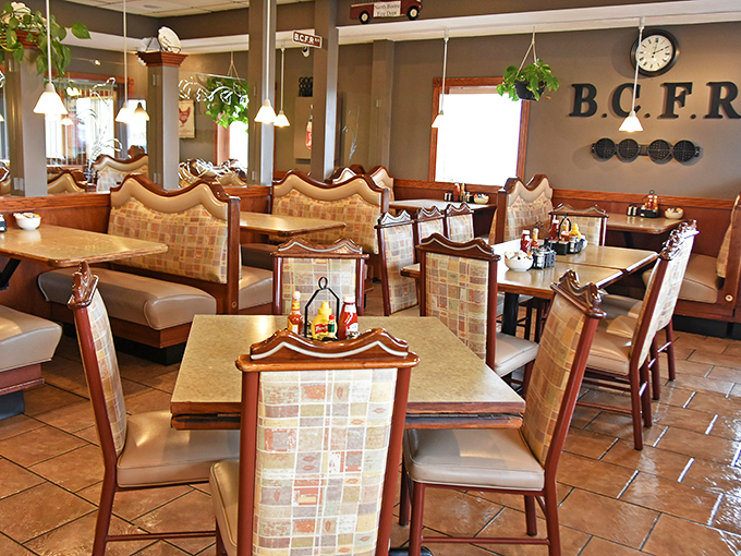 Hanging plants, comfortable booths, and that distinct "everyone's welcome" vibe—this dining room feels more like home than many living rooms.