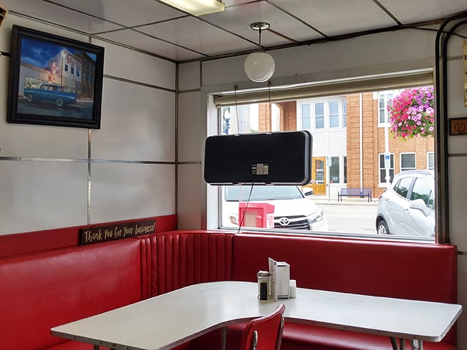 These booths have hosted countless conversations, celebrations, and cheeseburger revelations—each one squeaking its approval as you slide in comfortably.