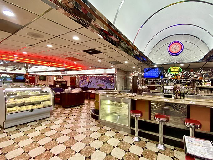 The dessert case and counter area—where important decisions are made and coffee flows like conversation at a family reunion.