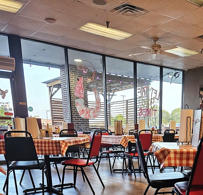Large windows flood the dining room with natural light, creating a space where the outside world feels welcome but the focus stays on the food.