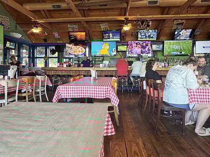 The dining room buzzes with anticipation as empty tables wait to become battlegrounds of butter, seasoning, and discarded shells.