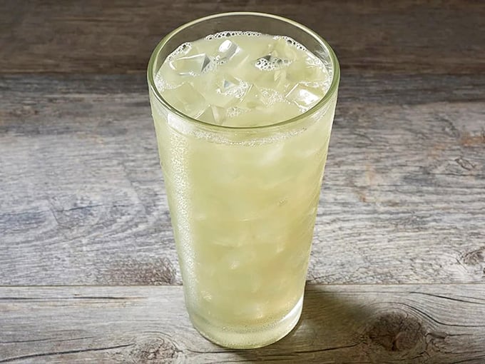 Clear, bright, and refreshing—this tall glass of lemonade stands ready to rescue taste buds between bites of savory steak and salty sides.
