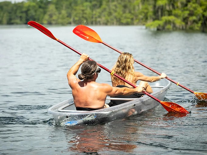 Paddling through liquid crystal – a transparent kayak journey that lets you see both above and below simultaneously.