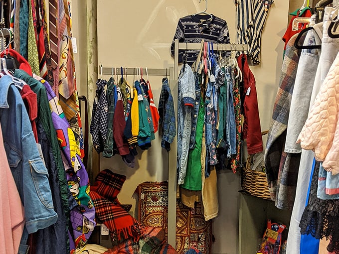 Vintage clothing tetris – where every colorful piece fits perfectly into the aesthetic puzzle. Pattern mixing before Instagram made it cool.