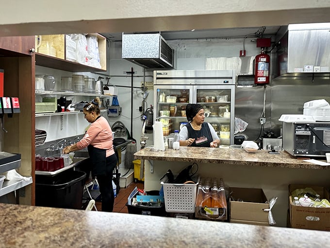 A glimpse into the kitchen where the magic happens. No fancy equipment, just skilled hands and recipes passed down through generations.