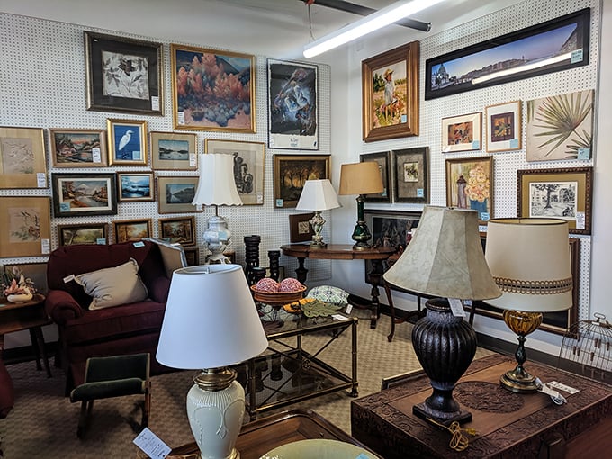 Wall art and lamps create a gallery-like corner where one person's redecorating decision becomes another's perfect find. That bird painting might just fly home with you.