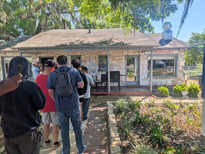 The line outside speaks volumes—people willing to wait in Florida heat for food must know something worth knowing.