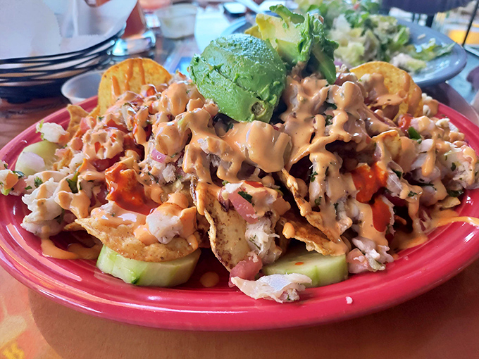 These nachos aren't just topped—they're smothered in a seafood fiesta that makes every chip feel like it won the lottery.