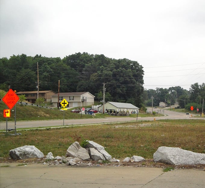 Even on cloudy days, this neighborhood has a not-so-secret weapon against the mundane—a supersized serving of roadside Americana.