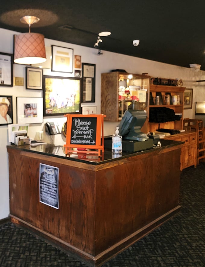 The host station, adorned with decades of memories and accolades, serves as the gateway to your steak journey. First impressions matter.