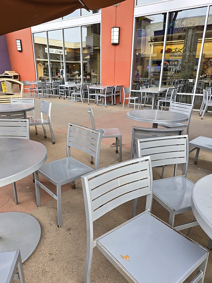 Outdoor seating strategically placed for the "I'll just rest here while you browse" crowd—every outlet mall's unsung heroes.