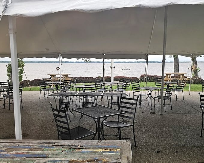 The lakeside tent isn't just dining with a view—it's dinner and a show, starring Lake Koshkonong in its most flattering light.