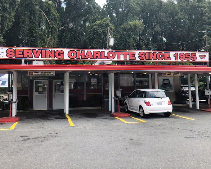 Classic drive-in parking spaces where generations have experienced the simple joy of eating excellent food in the comfort of their cars.