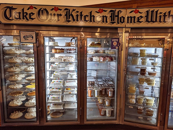 "Take Our Kitchen Home With You" isn't just a sign—it's a dessert display that makes willpower officially obsolete.