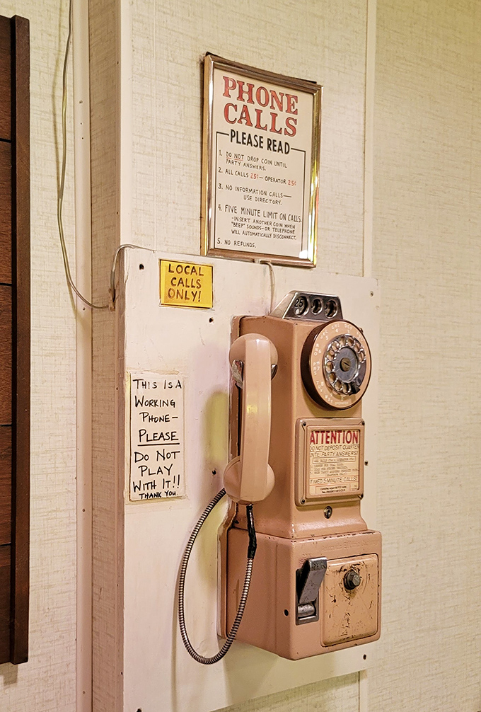 This payphone isn't just retro—it's a time machine with strict rules. "LOCAL CALLS ONLY!" feels like a forgotten language.
