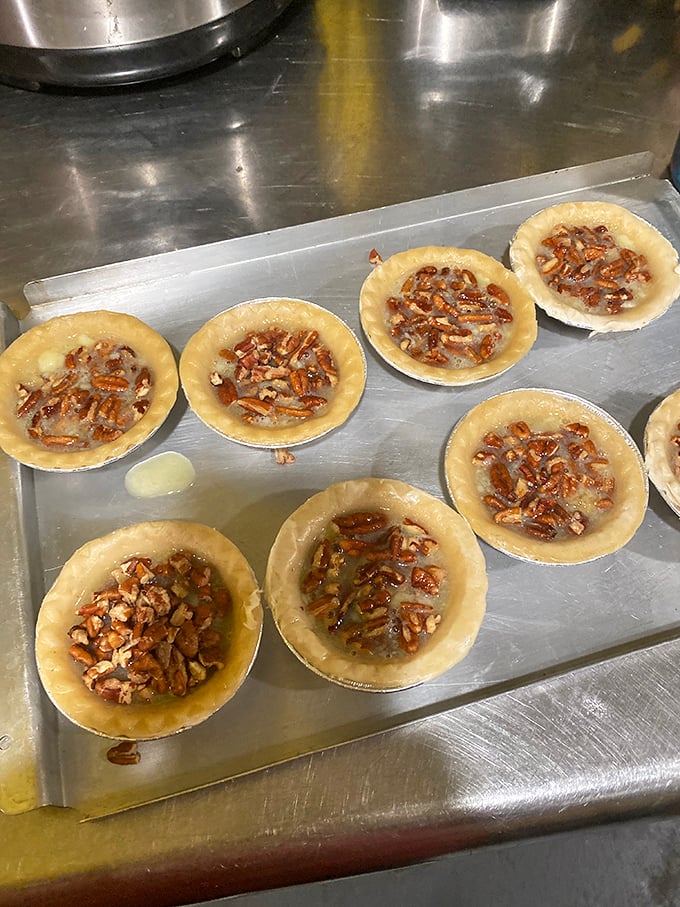 These aren't just pecan pies—they're Southern hospitality in pastry form, waiting to transform your ordinary day into something special.