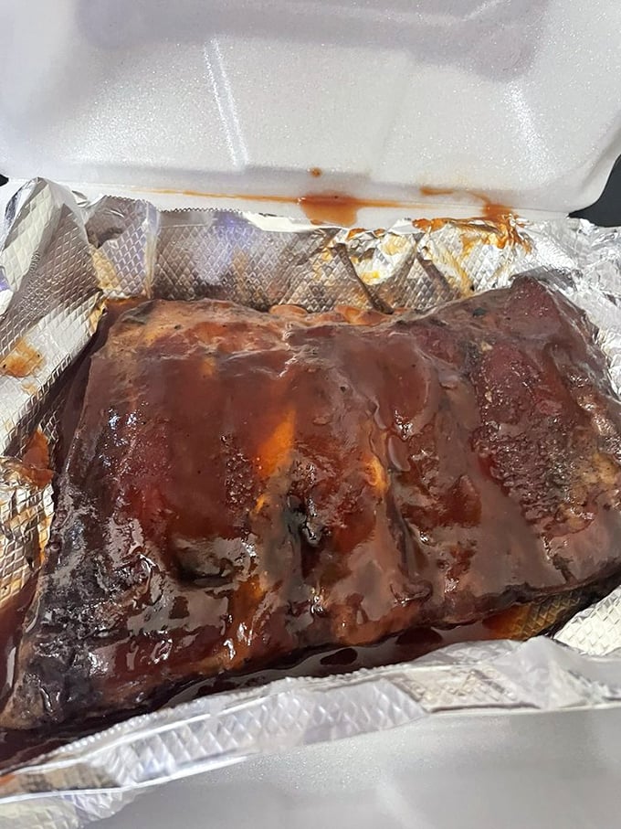 These ribs aren't just falling off the bone—they're practically jumping into your mouth. Sticky, smoky evidence that patience is indeed a virtue.