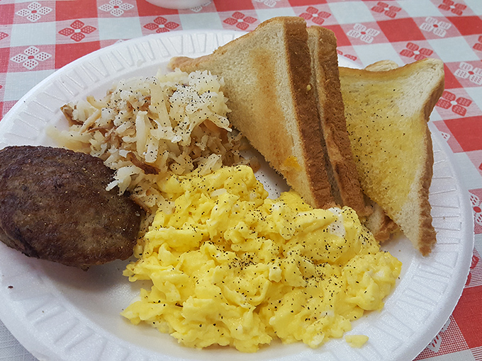 Scrambled eggs that achieve that elusive perfect texture—neither too dry nor too wet—paired with hash browns and toast for the breakfast of champions.