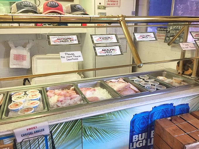 The seafood case of dreams—where tomorrow's dinner waits patiently behind glass, fresh from local waters to your table.