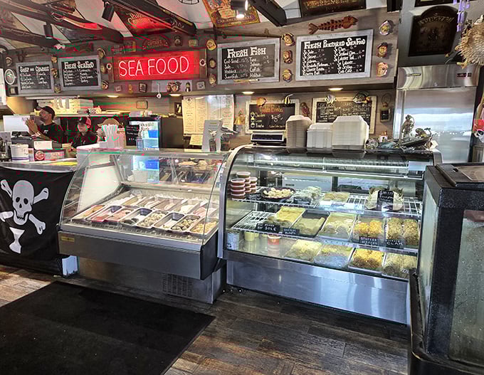 The seafood display case—where today's catch meets tomorrow's memories. Fresh possibilities await behind glass, like an aquatic jewelry store.