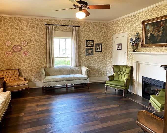 The sitting room where time slows down and conversations linger. That fireplace has warmed more Tennessee tales than Jack Daniel's himself.